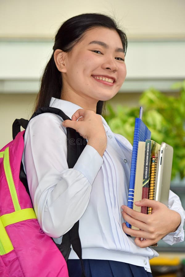 A Youthful Chinese Female Student Smiling Stock Image - Image of ...