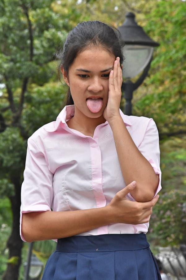 Youthful Filipina Girl Poor Health Wearing Pink Shirt In Park Stock Image Image Of Adorable