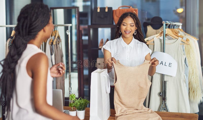 Youve Scored Quite a Bargain Here. a Shop Assistant Packaging a ...