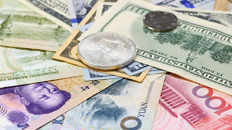 One Chinese Yuan Coin Versus Bundle of US Dollars Stock Photo - Image ...