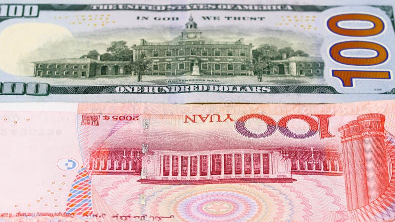 One Chinese Yuan Coin Versus Bundle of US Dollars Stock Photo - Image ...