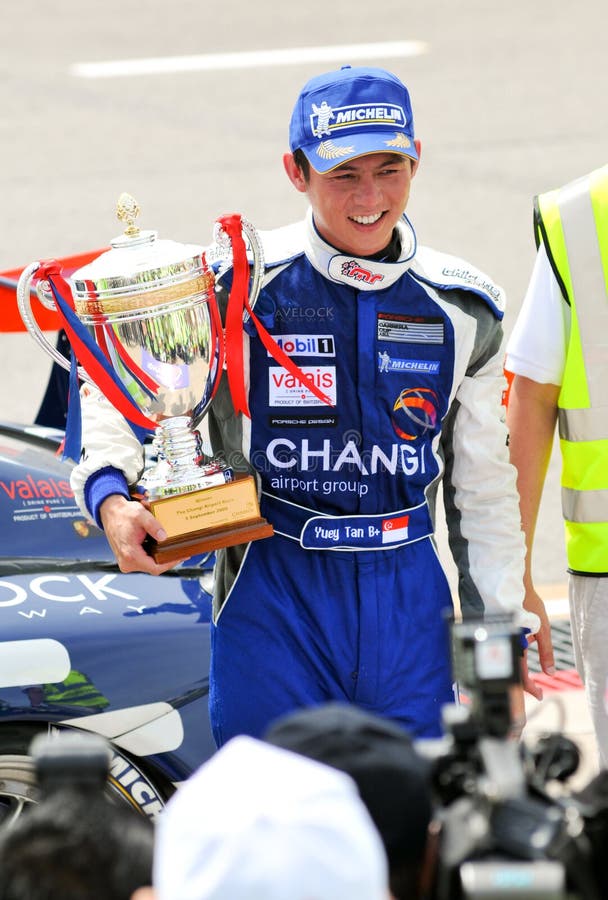 Yuey Tan posing for photos editorial photography. Image of changi ...