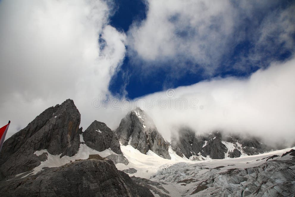 Yulong mountain stock photo. Image of cloud, mountain - 21389986