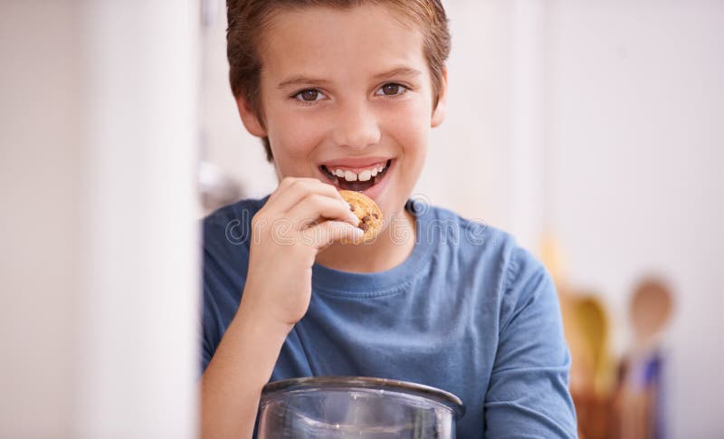 Yum Yum. a Young Boy Eating a Cookie while Holding a Cookie Jar. Stock ... Yum Yum. a Young Boy Eating a Cookie while Holding a Cookie Jar. Stock ...