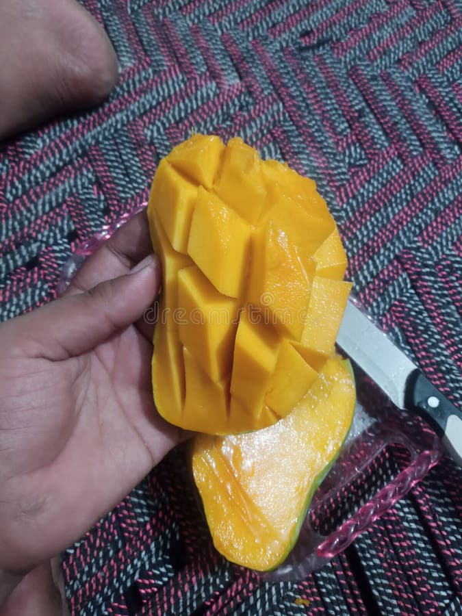 Yummy ðŸ˜‹ delicious mango stock image. Image of yellow - 252640317