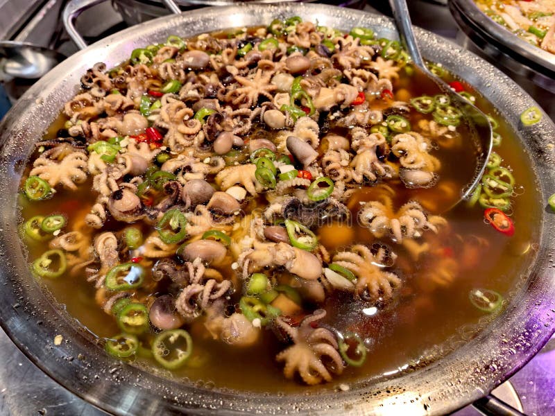 Yummy Baby Octopus with Red and Green Chillies. Stock Image - Image of ...