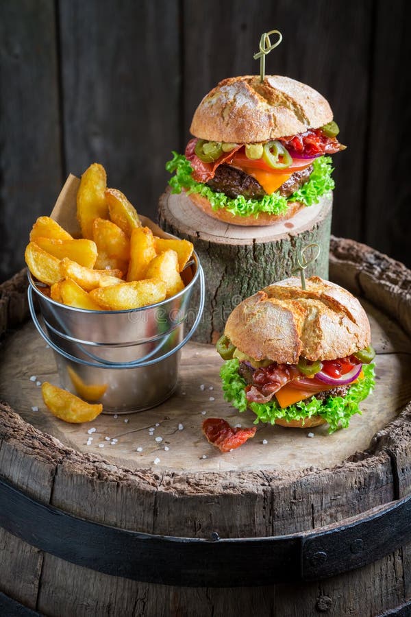 Yummy Burger. Serving Cheeseburger Or Hamburger With Salad Tomatoes ...