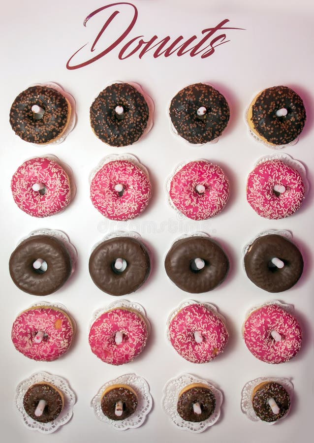 A yummy pink donut wall stock photo. Image of festive - 173944678