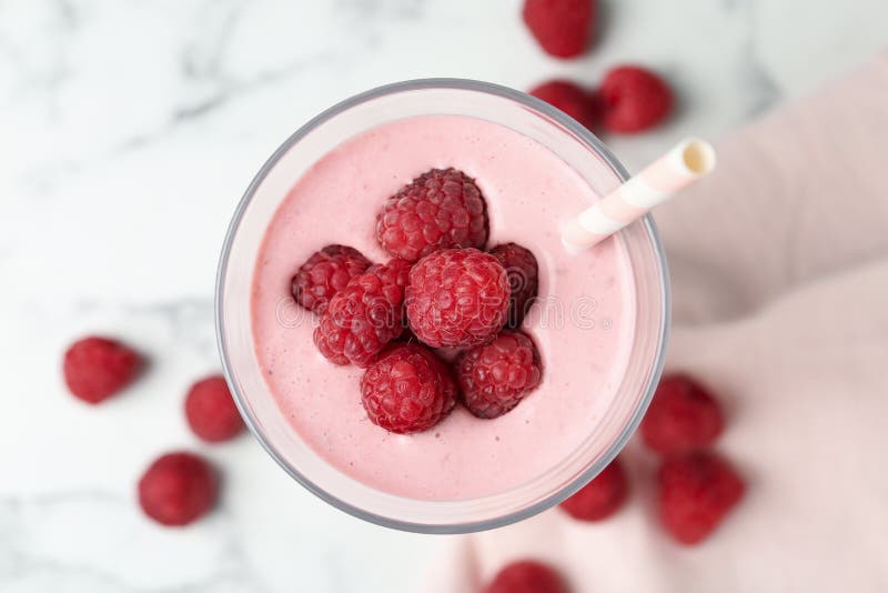 Yummy Raspberry Smoothie in Glass on Marble Table, Top View Stock Image ...