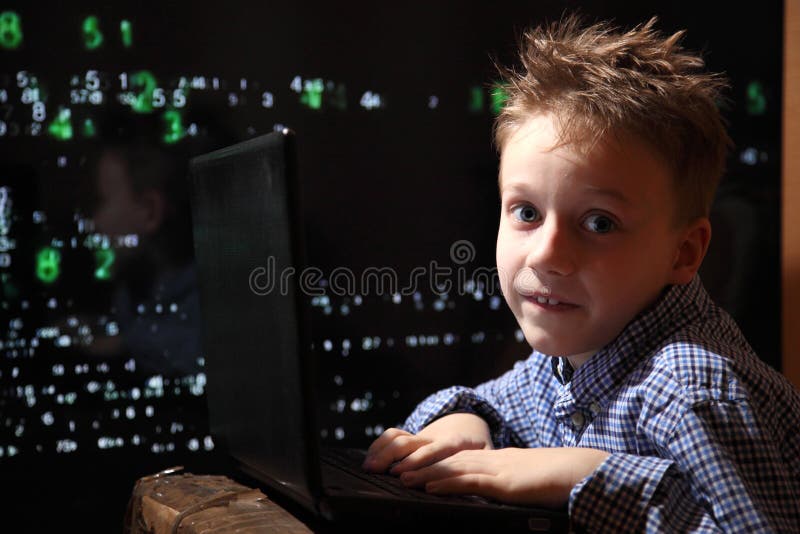 YYoung Schoolboy Prodigy - a Hacker. Hacker at Work. Stock Photo ...