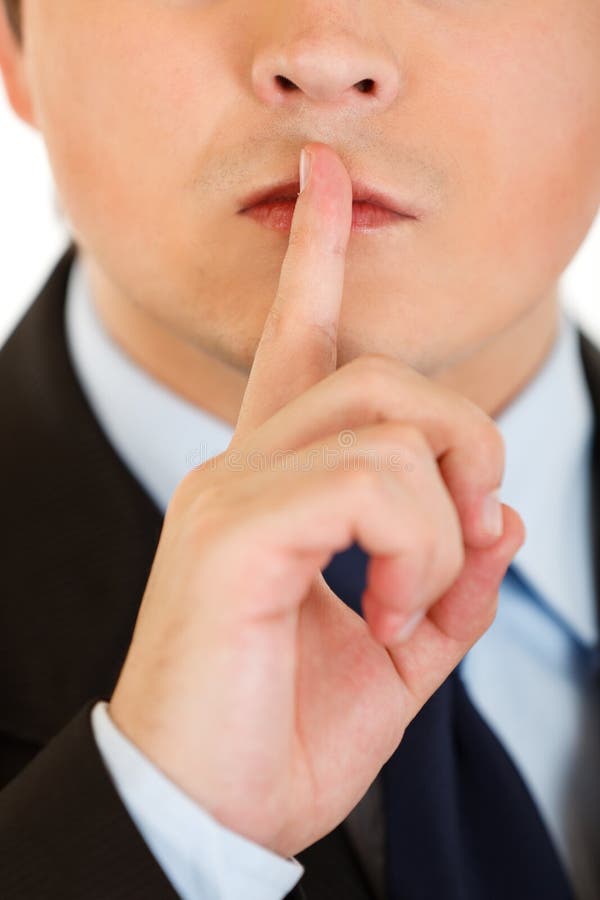 Zakenman Met Vinger Bij Mond Het Gebaar Van Shh Stock Afbeelding