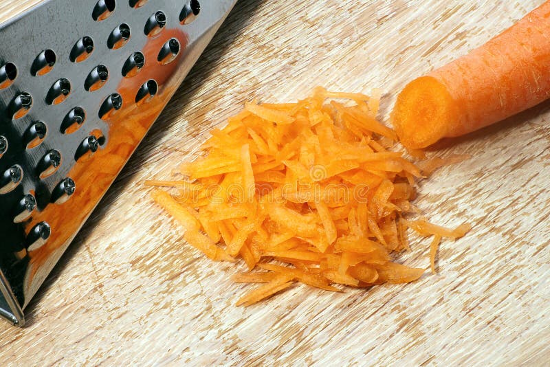 Zanahoria Rallada Con El Rallador Imagen de archivo - Imagen de ...