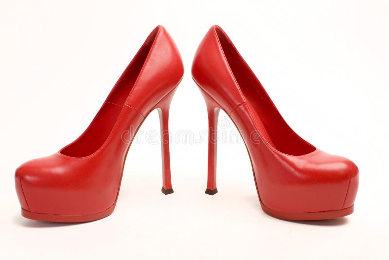 Zapatos rojos de la mujer foto de archivo. Imagen de blanco - 21592484