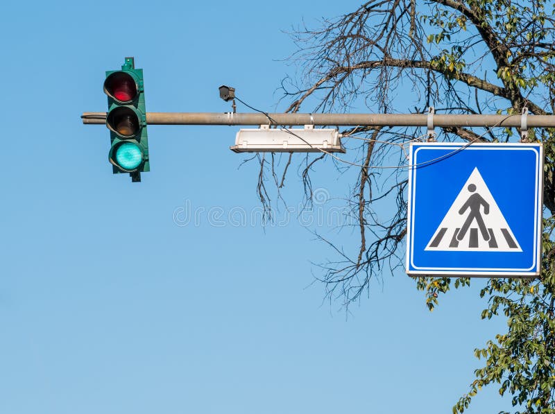 Zebra Crossing Sign and Traffic Light Showing Green Light in Bucharest ...