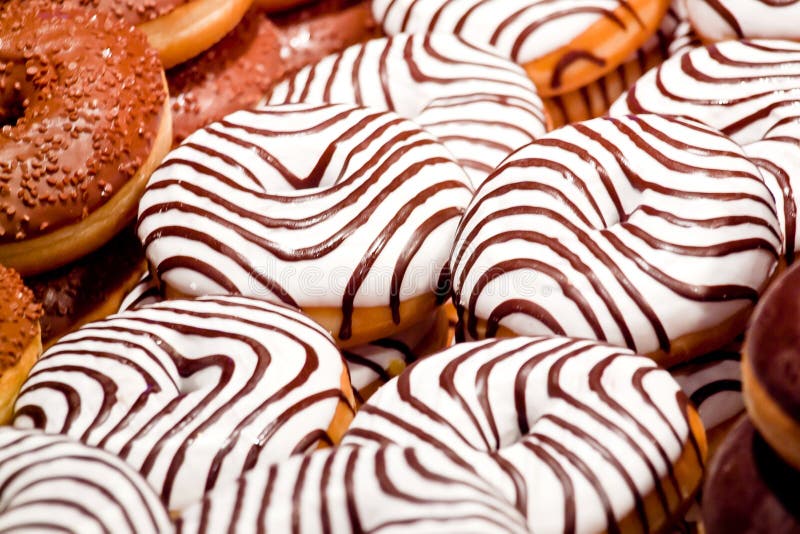 Zebra Donuts, Chocolate Donuts and Donut Hazelnut 1 Stock Image - Image ...
