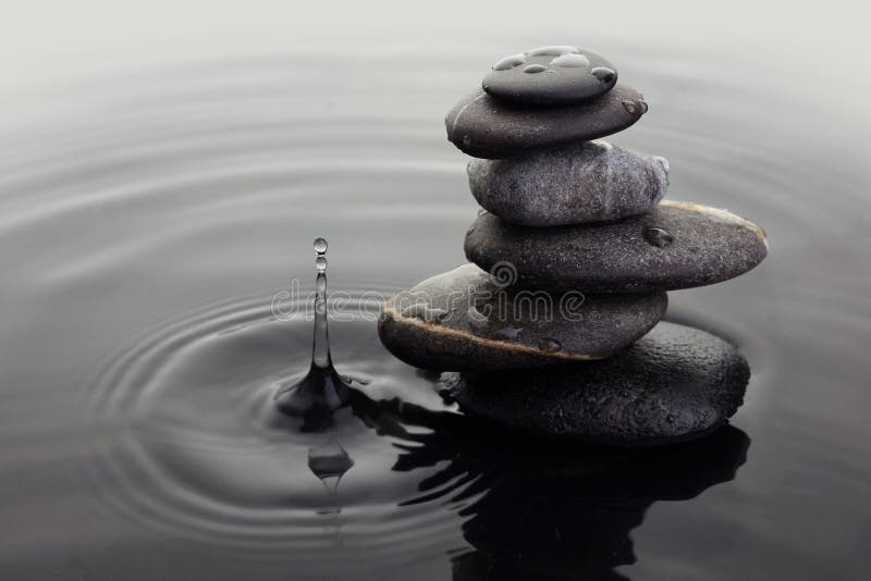 A Zen Black Balance Stones in a Water with Water Drop Stock Photo ...