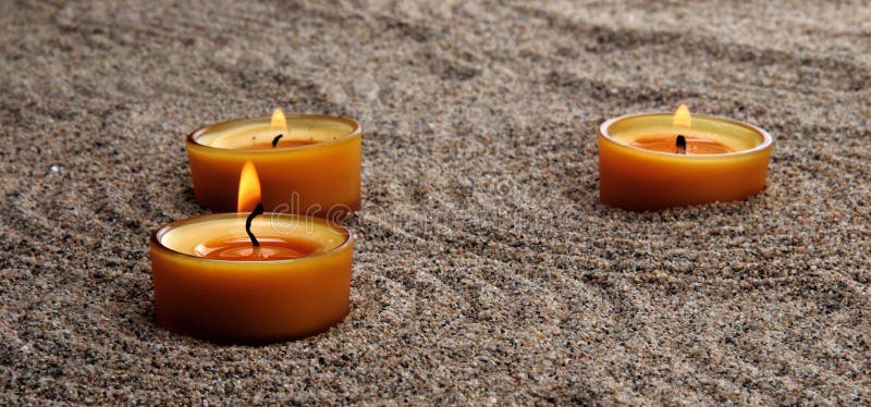 Candles in the Sand. Calming Patterns on the Sand Stock Photo - Image ...