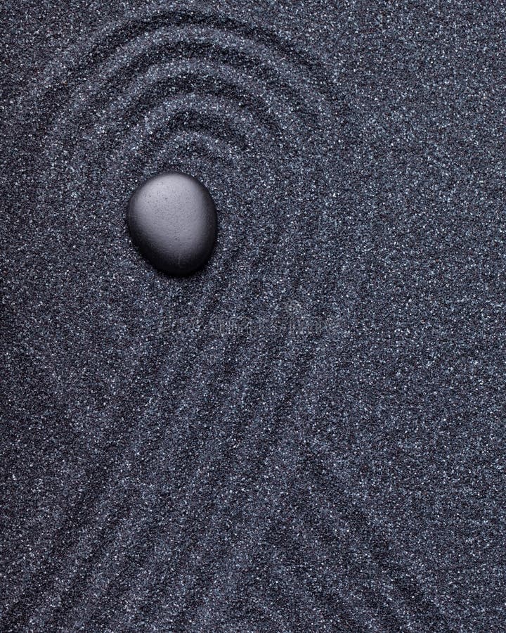 Zen Garden with a Black Stone with Wave Patterns in the Sand Stock ...