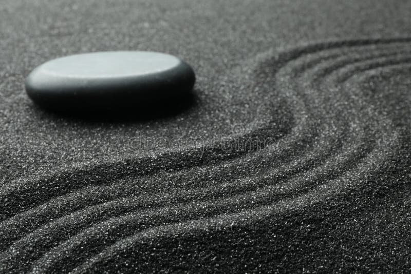 Zen Garden Stone on Black Sand with Pattern, Top View Stock Photo ...