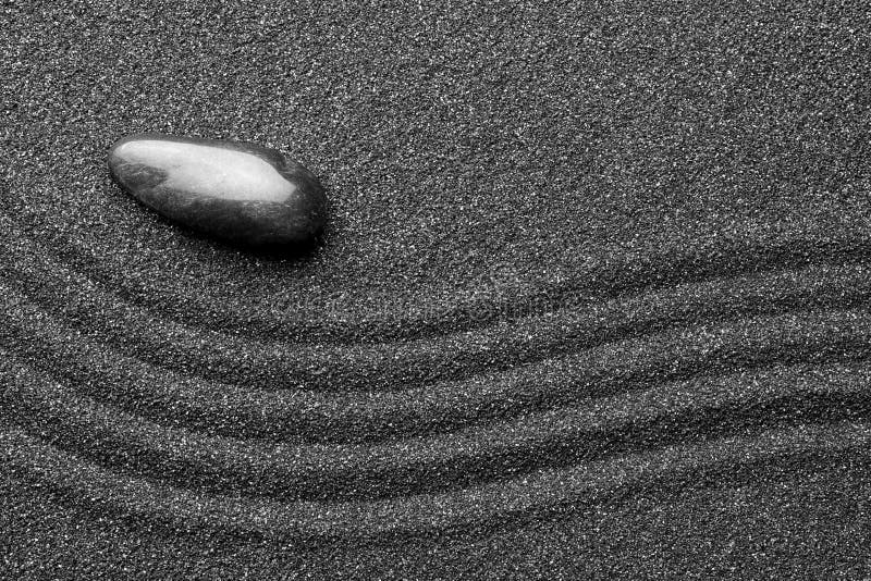 Zen Garden Stone on Black Sand with Pattern, Top View Stock Photo ...