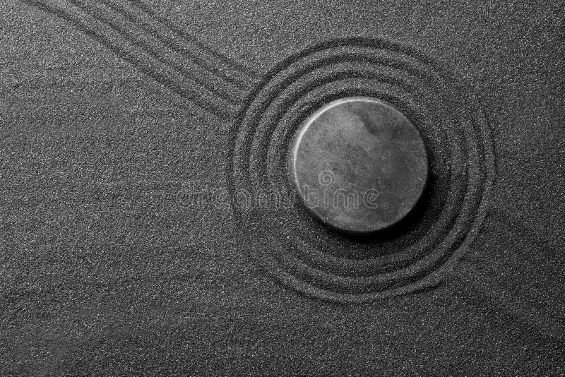 Zen Garden Stone on Black Sand with Pattern Stock Photo - Image of ...