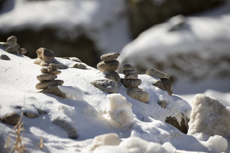 Zen Meditation Background - Snow-covered Balanced Stones Stock Photo ...