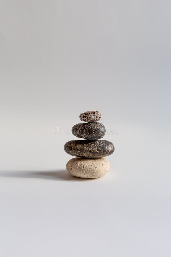 Zen Pebbles Balancing on White Background Stock Photo - Image of iron ...