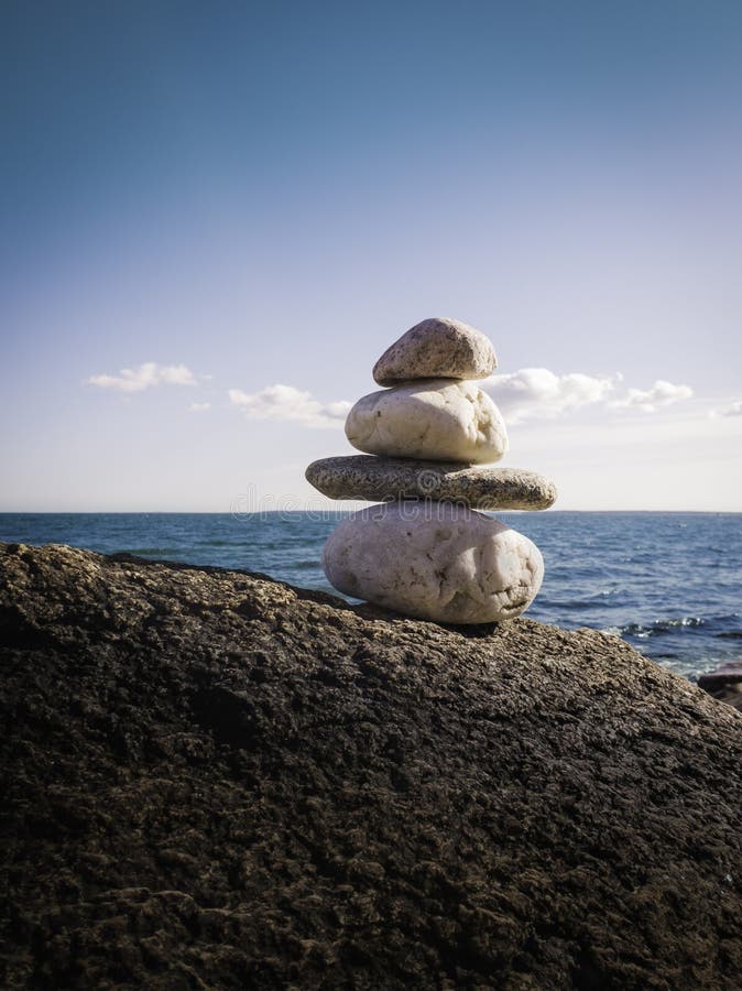 Zen Rocks on a Large Glacial Boulder at Sea Stock Image - Image of ...