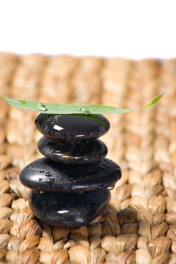 Zen Rocks Stacked with a Leaf Stock Photo - Image of isolated, flora ...