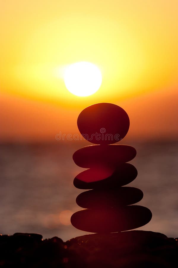 Pebbles at sunset stock image. Image of coast, light - 22808235