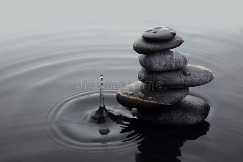 Zen Stones in Balanced Pile in Water on Rippled Water Surface and Water ...