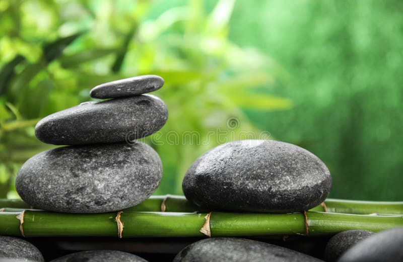 Zen stones on bamboo stock photo. Image of balance, bamboo - 143177694