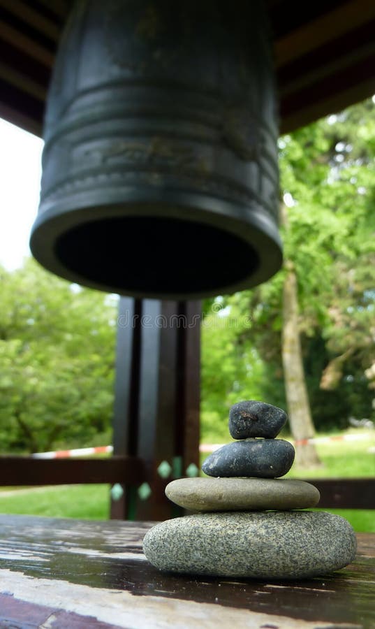 Zen Stones and Japenese Bell Stock Photo - Image of people ...