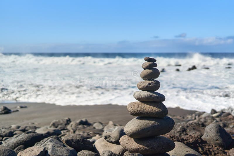 Zen stones on ocean shore stock image. Image of peace - 310949983