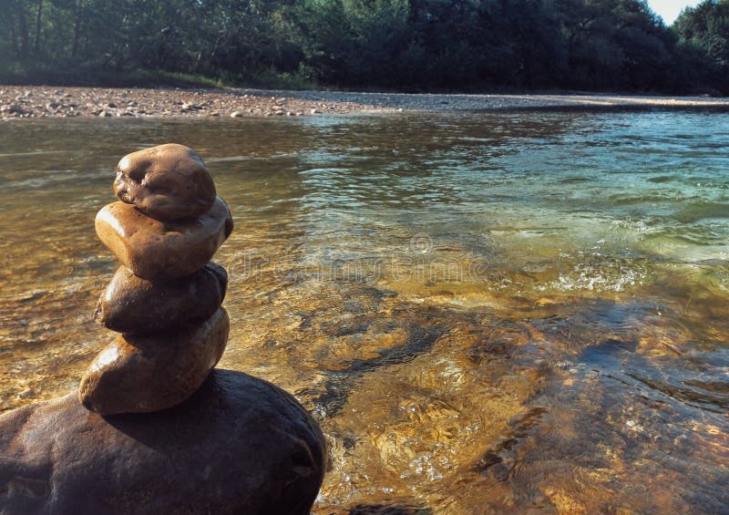 Zen Tower of Stones on the River Stock Photo - Image of pebble, symbol ...