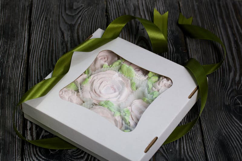 Zephyr Flowers. Zephyr in a Cardboard Box. Tape for Tying the Box Stock ...