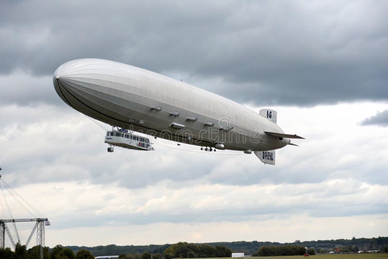 Zeppelin Airship Gliding through the Sky Stock Illustration ...