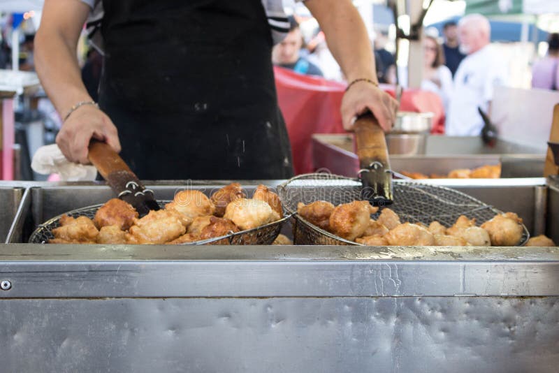 Zeppoles in the Making stock photo. Image of cook, festival - 93745028