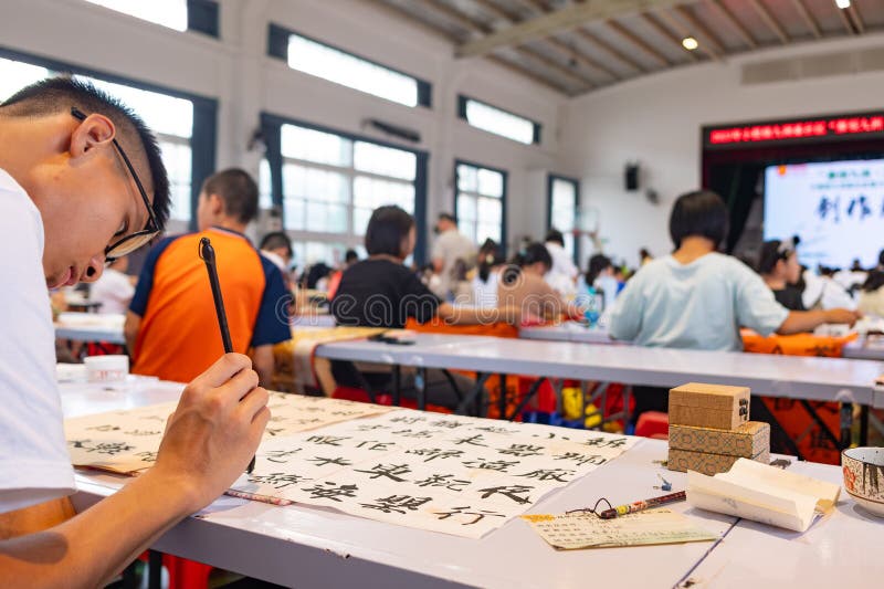 Students in Calligraphy Competition Using Chinese Brushes at Horizontal ...
