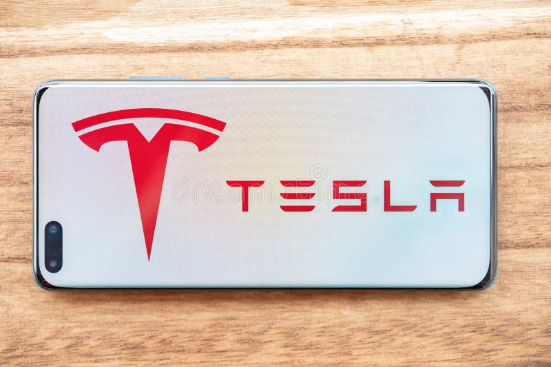A Mobile with Tesla Logo at Horizontal Composition Editorial ...