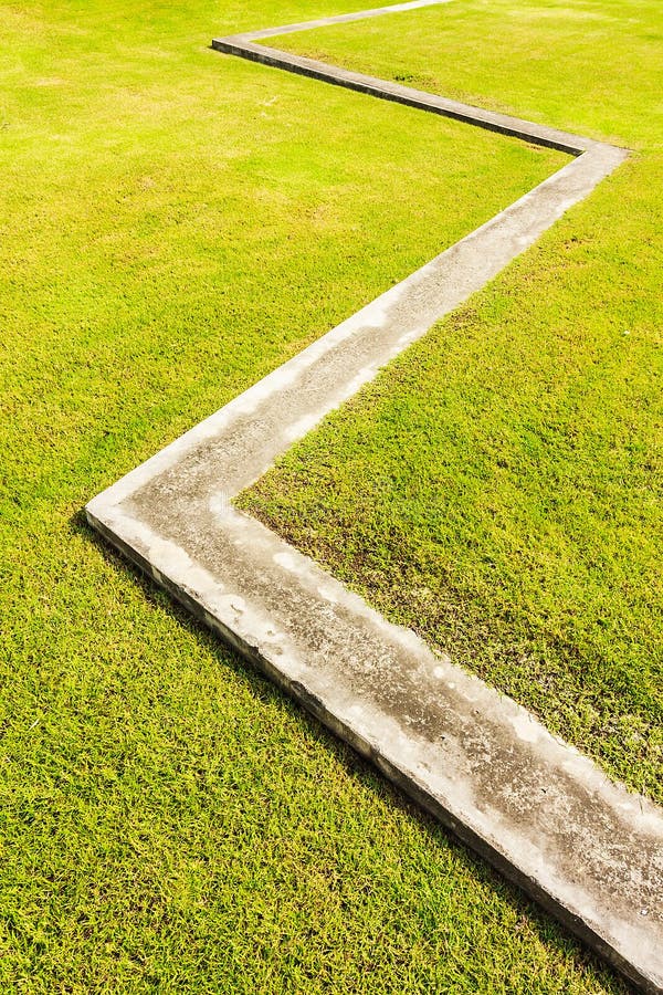 Zigzag Concrete Curb and Green Grass Stock Image - Image of movement ...