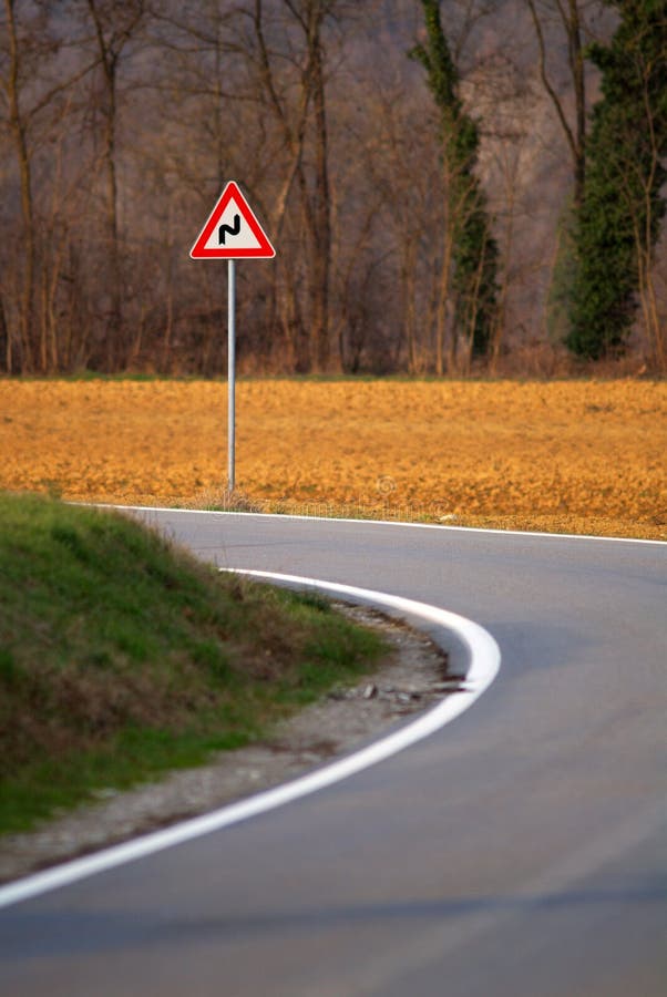 Zigzag sign on road bend stock photo. Image of danger - 4271034