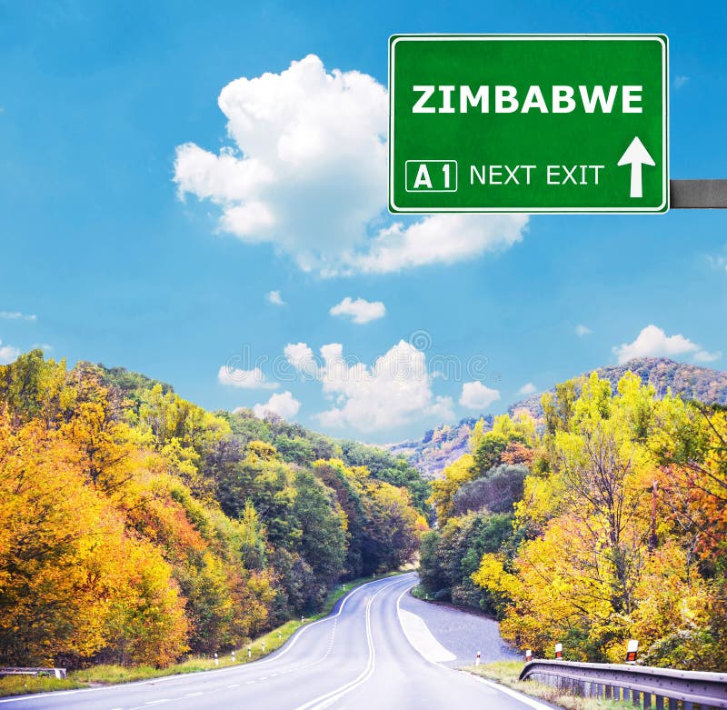 ZIMBABWE Road Sign Against Clear Blue Sky Stock Photo - Image of guide ...