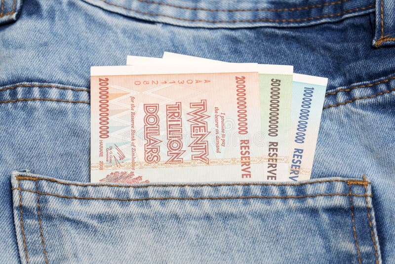 Zimbabwean Dollar in the Pocket of Blue Jeans Stock Photo - Image of ...