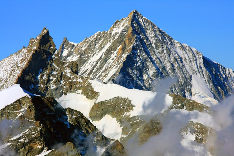 Zinalrothorn and Weisshorn stock photo. Image of climb - 7656512