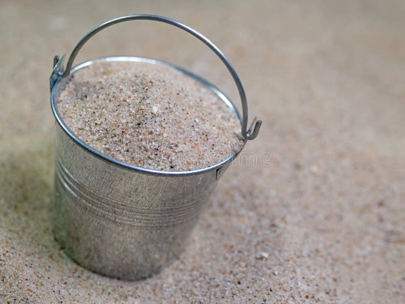 Zinc Bucket Filled with Quartz Sand in the Sand Stock Photo - Image of ...