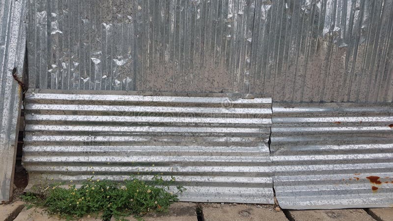 Zinc tile used as a fence stock photo. Image of used - 249457374