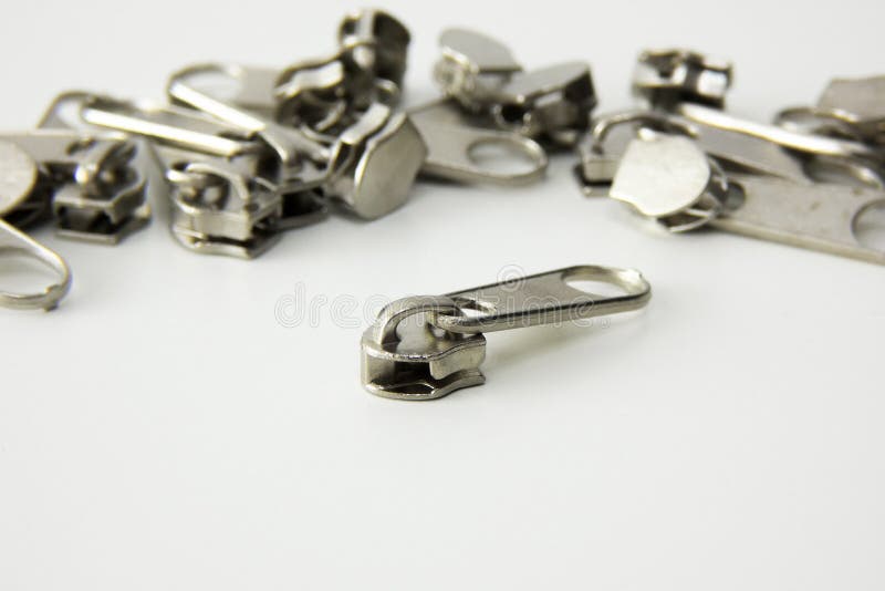 Zip Fastener with Group of Sliders in the Background Stock Image ...