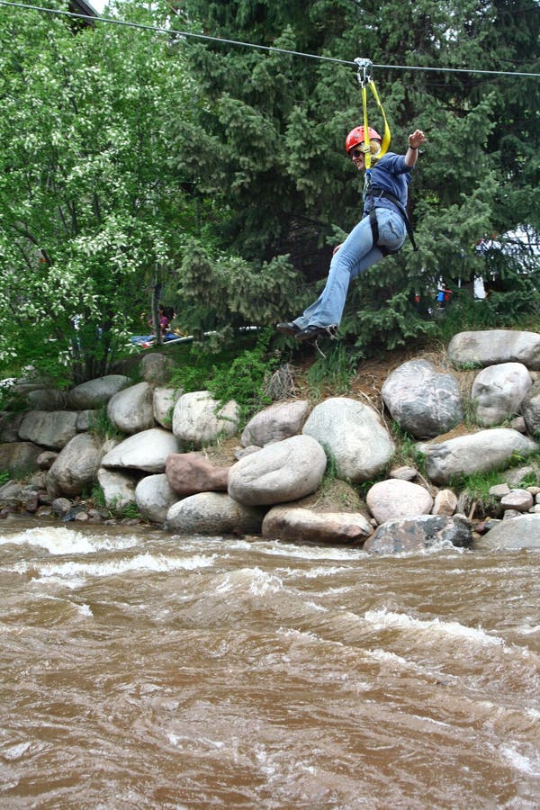 Young Girl on a Zip Line Over Canyon. Stock Image - Image of young ...