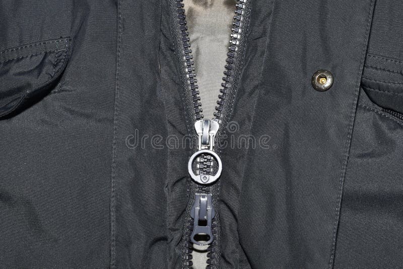 Zip lock on the jacket. stock image. Image of zipper - 268204325